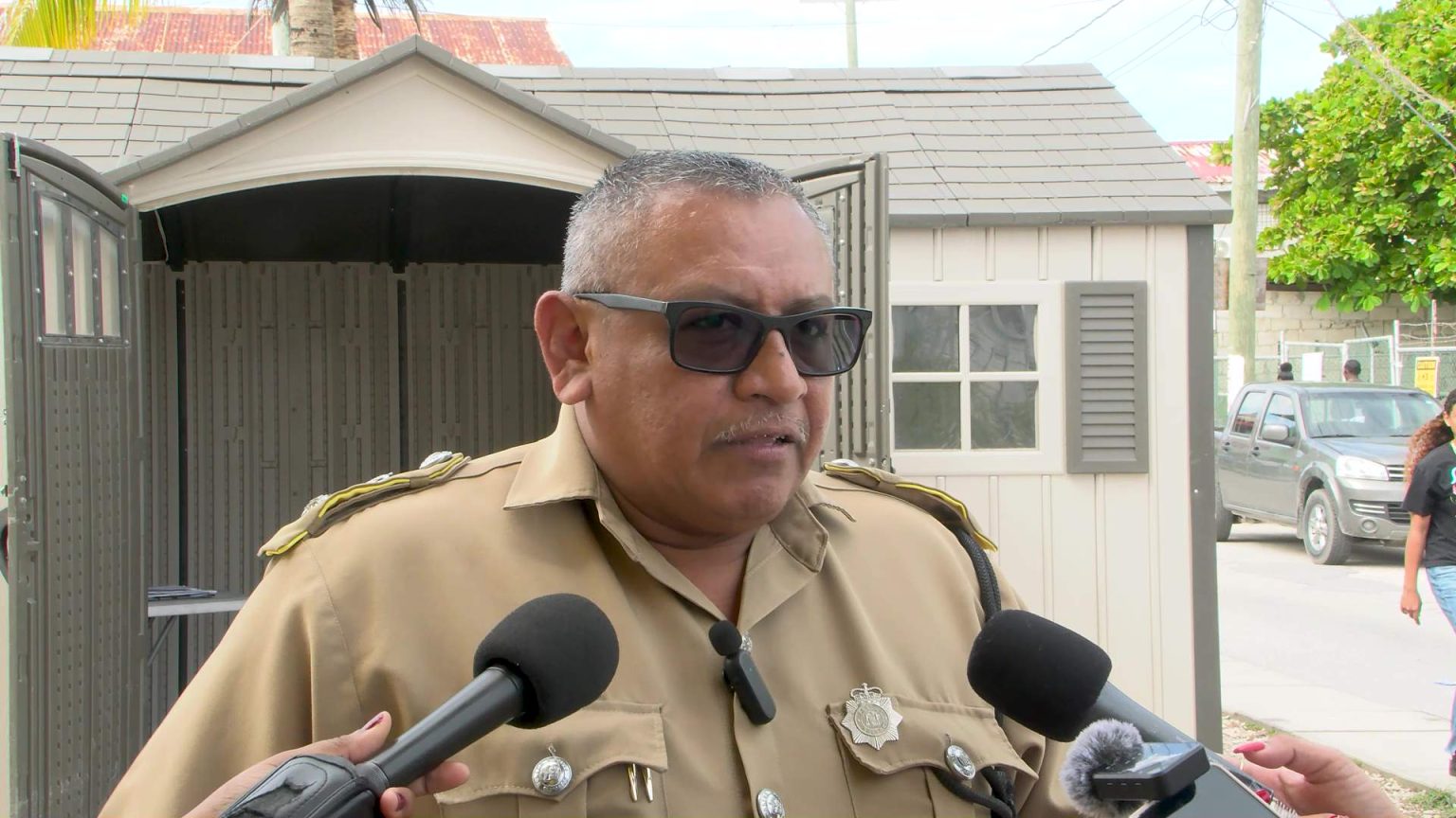 Police Officer Under Investigation for Shoving Woman | Greater Belize Media